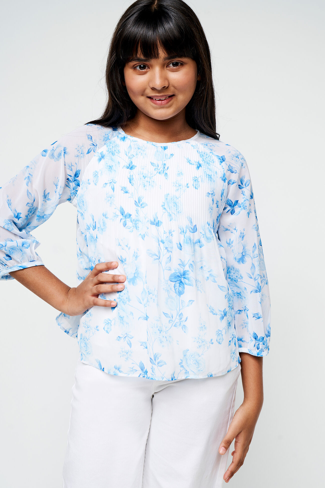 Buy our White Floral Flared Top online from ANDIndia SC- SS23KG103TN213